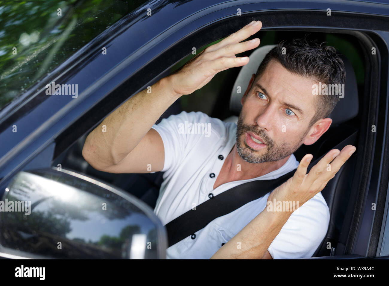very upset and stressed man sitting inside a car Stock Photo - Alamy