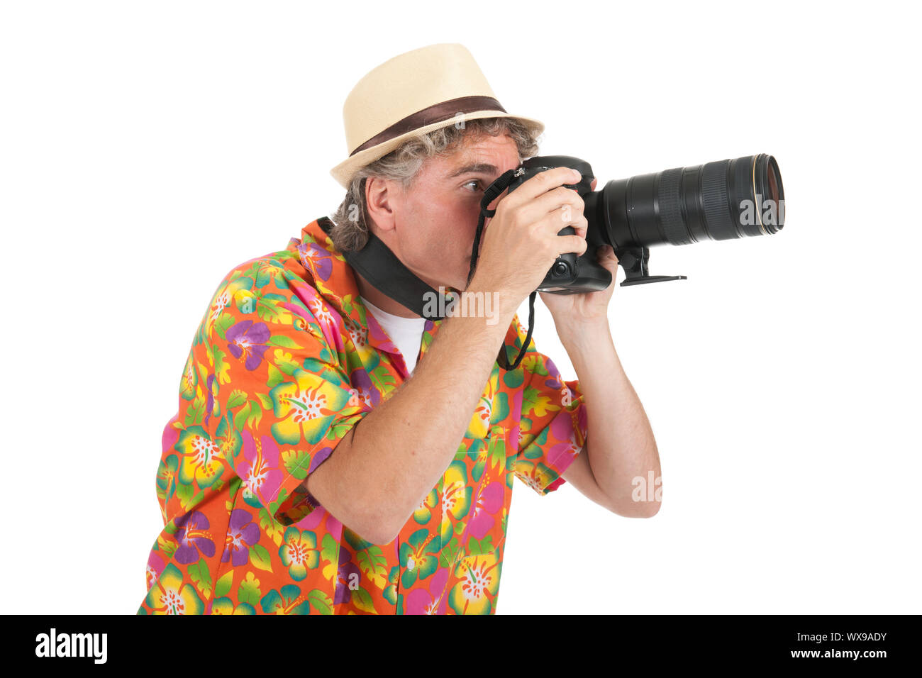 Typical tourist with big camera taking pictures Stock Photo - Alamy