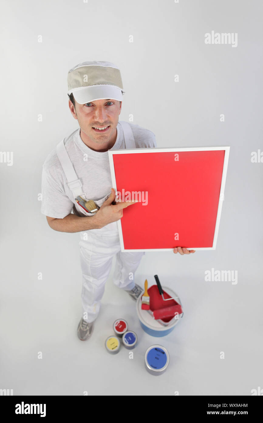craftsman painter showing the quality of his paint Stock Photo - Alamy