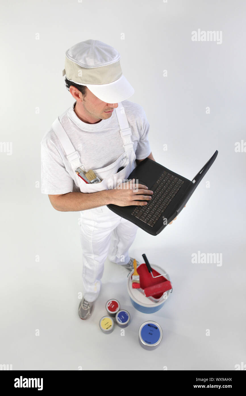 Painter with computer Stock Photo - Alamy