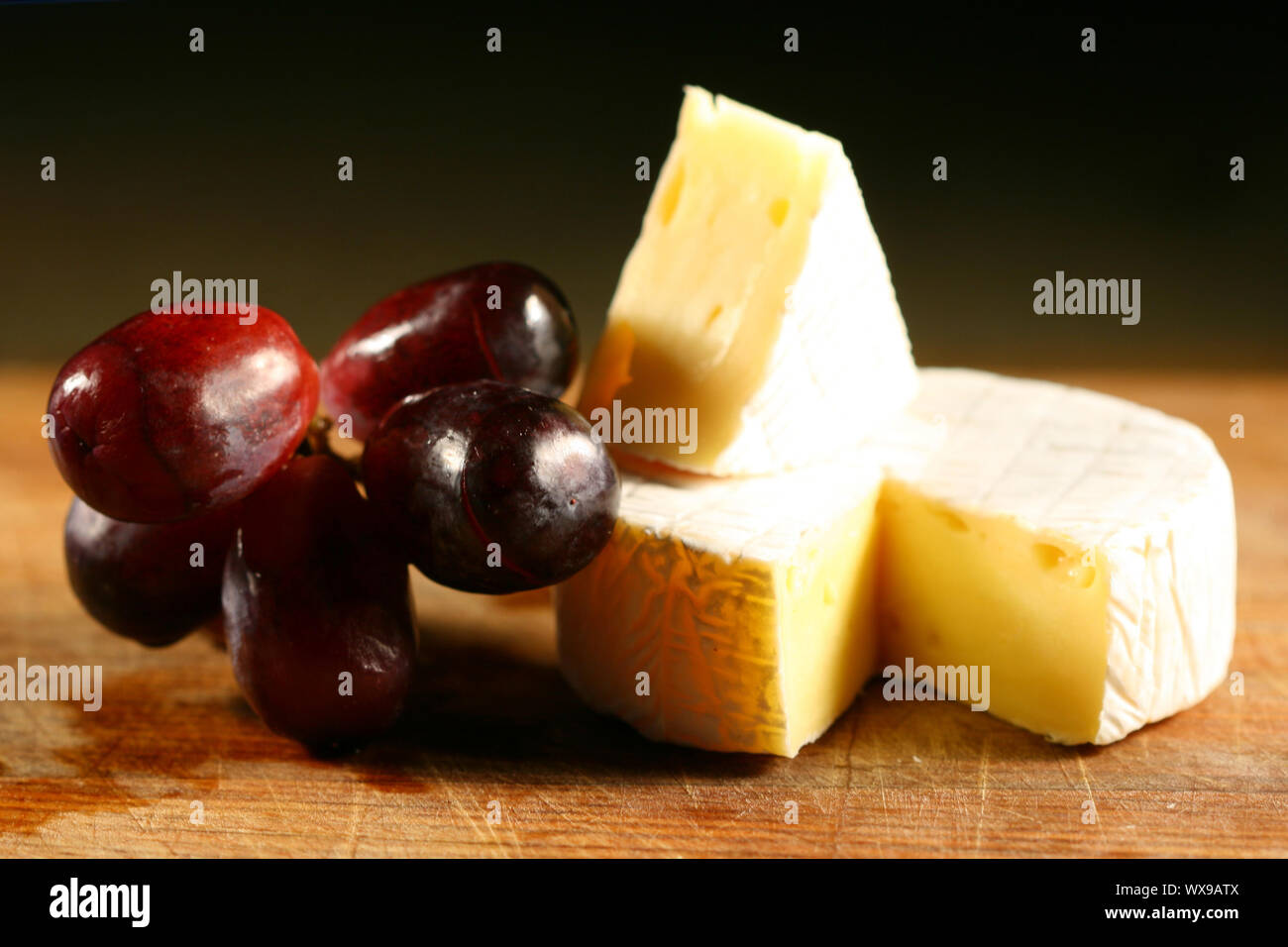 cheese brie and grape gourmet food Stock Photo - Alamy