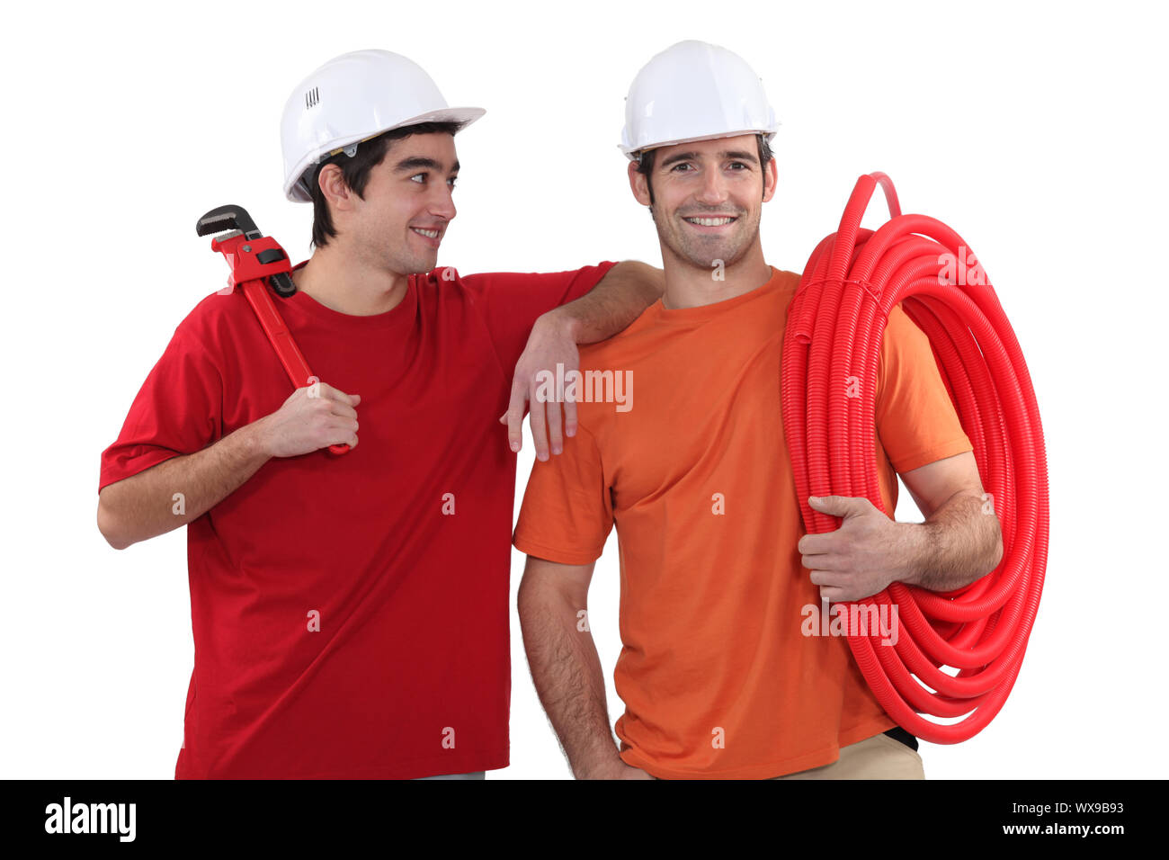 Two plumber friends Stock Photo - Alamy