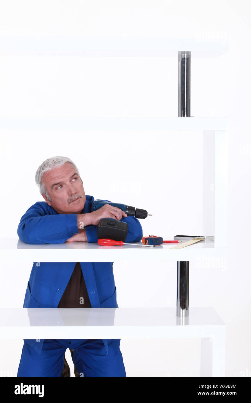 Man riding shelf Stock Photo - Alamy