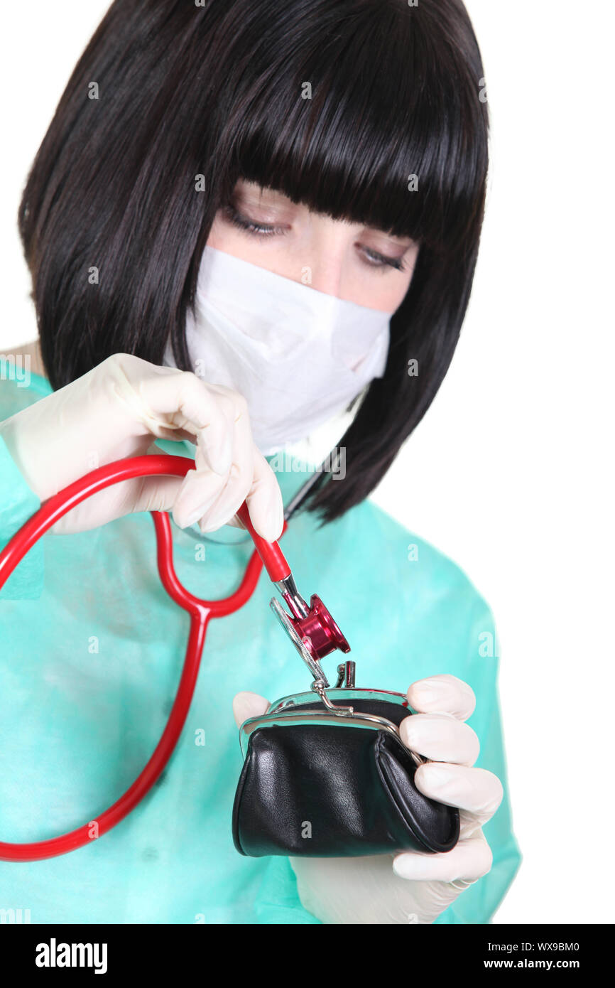 Nurse using stethoscope on purse Stock Photo - Alamy