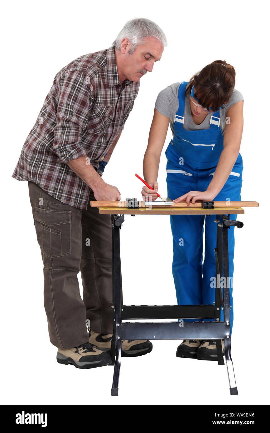 Carpenter and his apprentice Stock Photo - Alamy