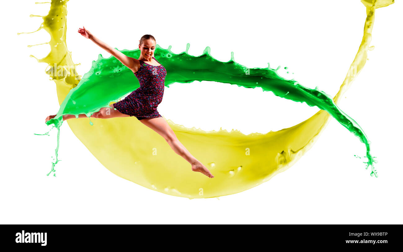 Dancer jumping on the background color paint splashes Stock Photo - Alamy