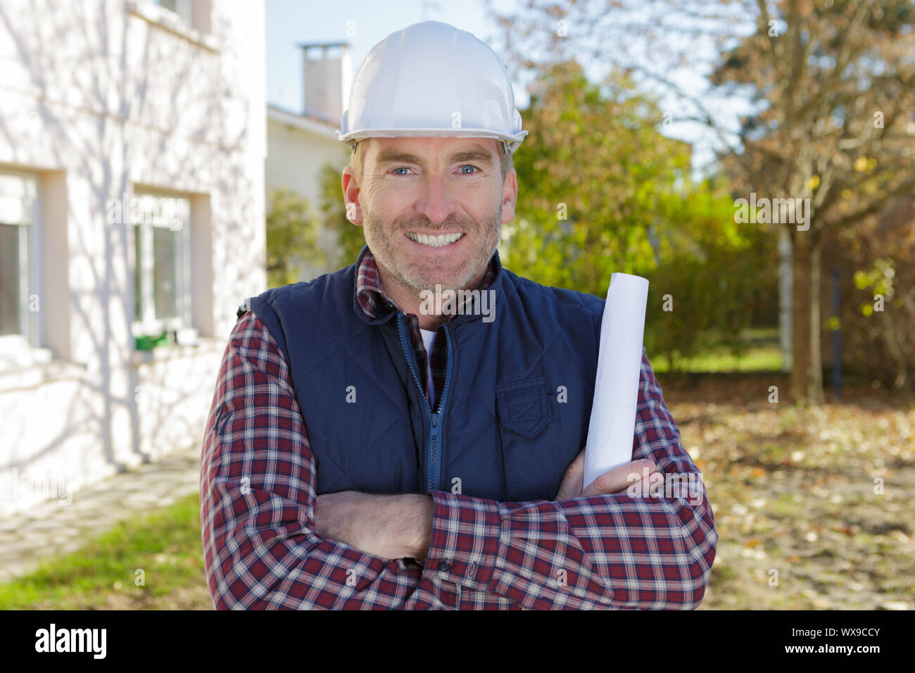 portrait of happy builder outdoors Stock Photo - Alamy