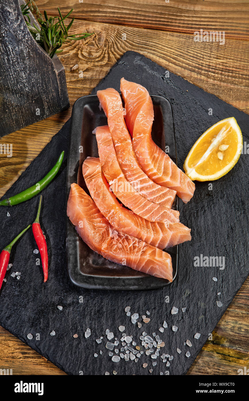 Red Fish And Oil Stock Photo - Alamy