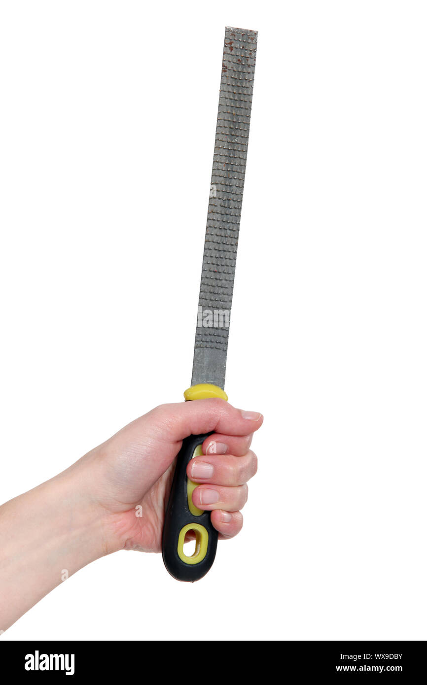 Hand holding a steel rasp Stock Photo - Alamy