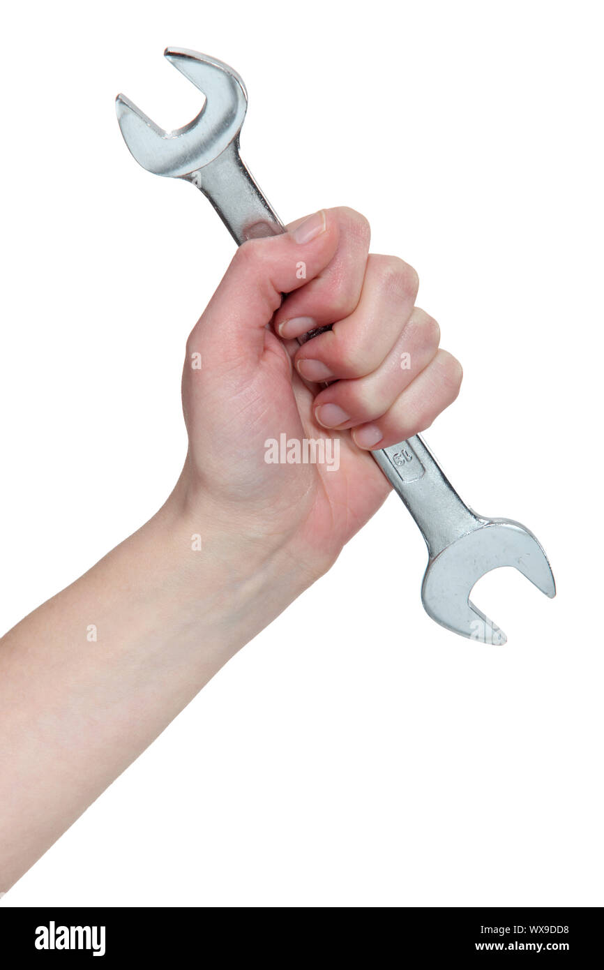 Hand holding a spanner Stock Photo - Alamy