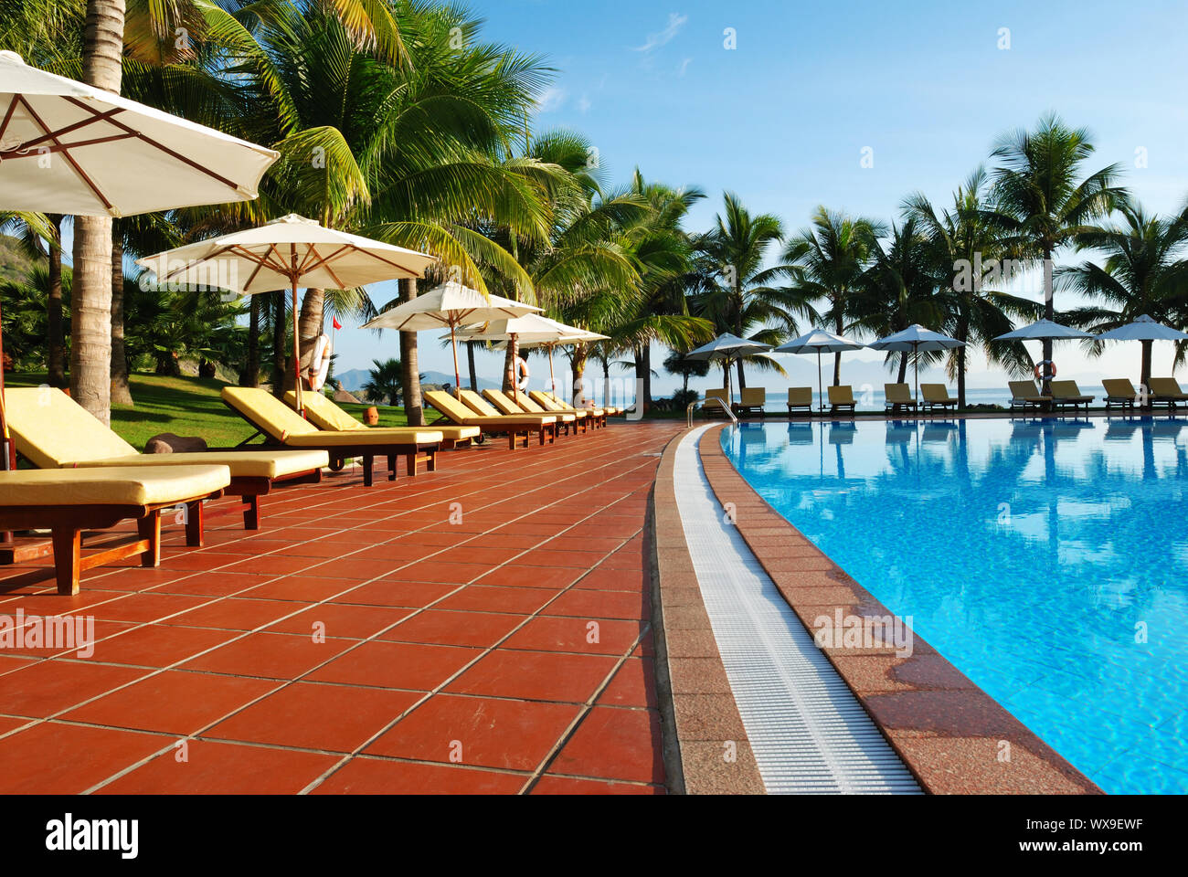 Tropical pool in luxury hotel Stock Photo - Alamy