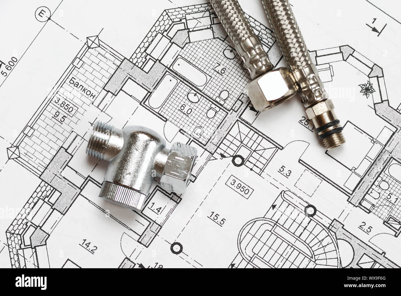 Pipes over house plan blueprints Stock Photo - Alamy
