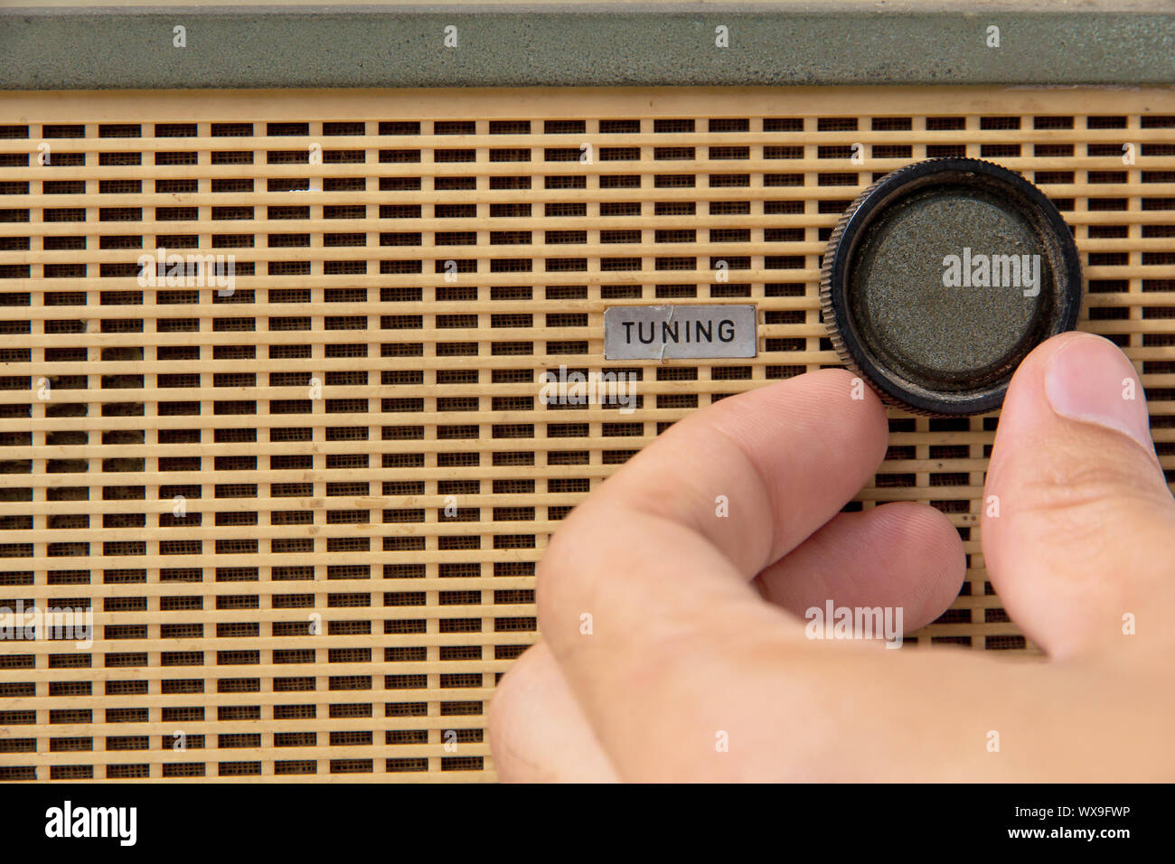 hand with tuner radio knob Stock Photo - Alamy