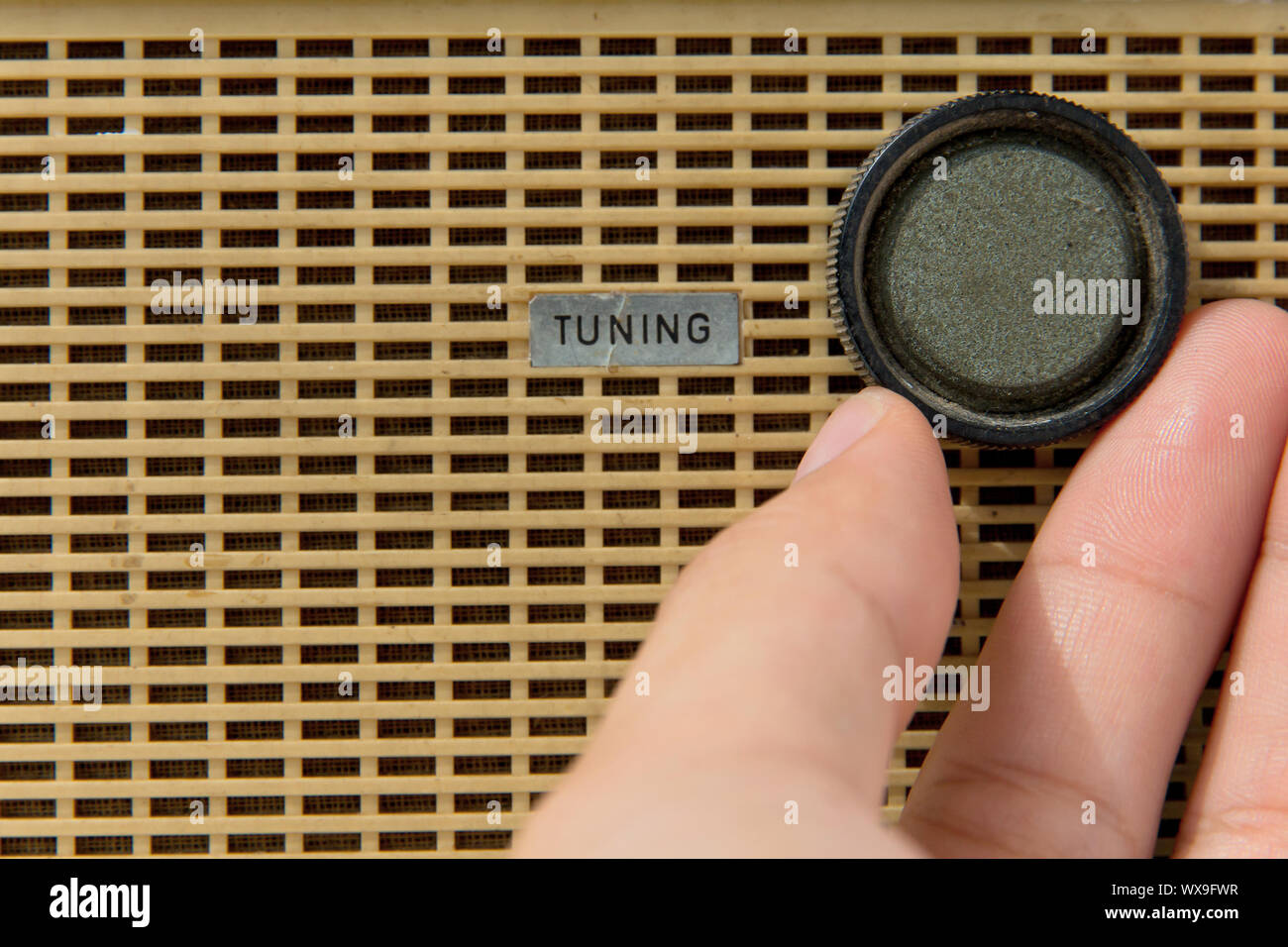 hand with tuner radio knob Stock Photo - Alamy