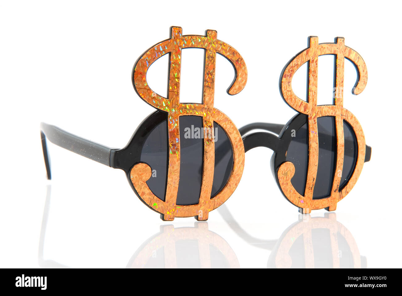 Glasses to look trough the dollar sign Stock Photo - Alamy