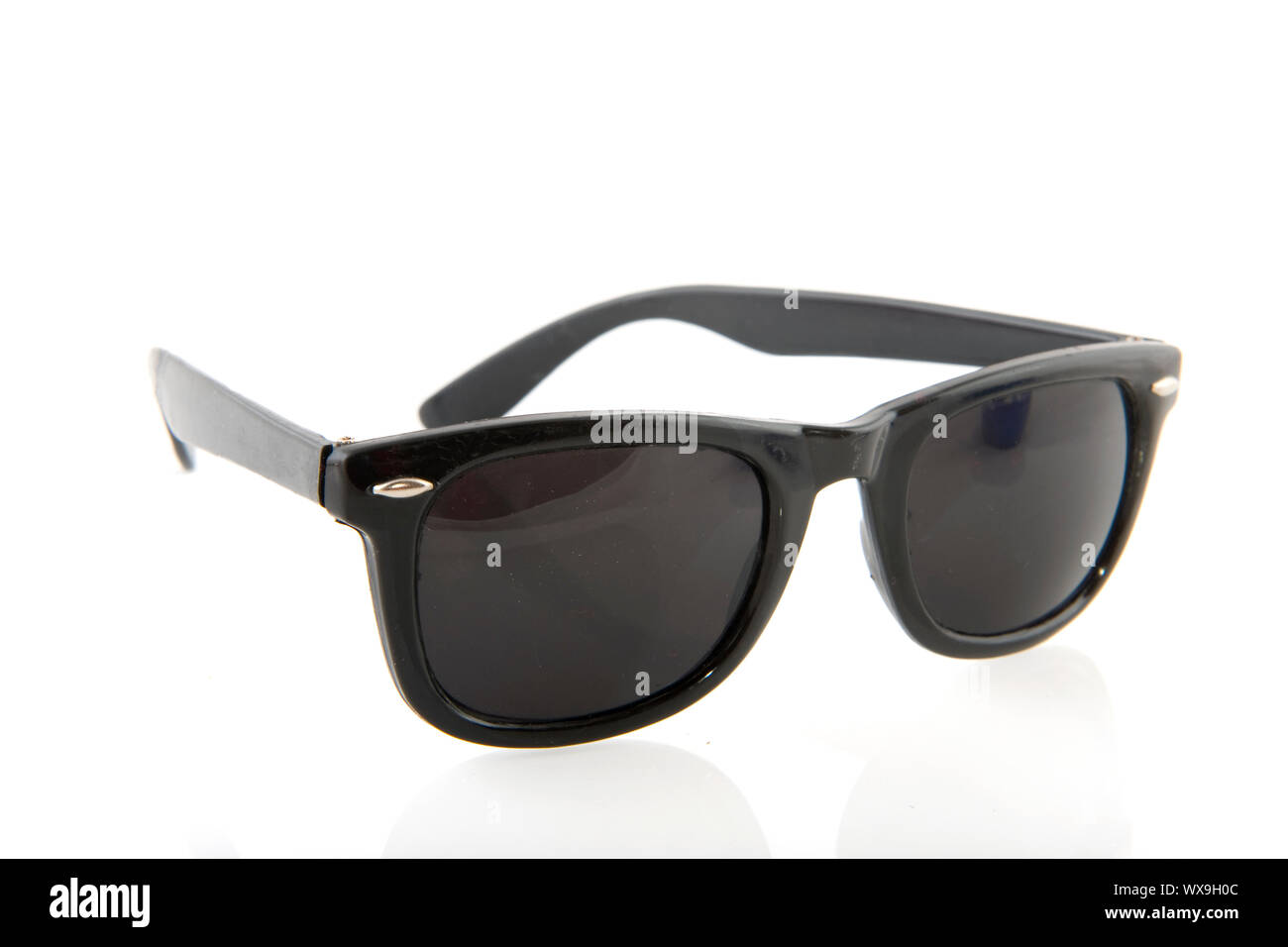 simple black sunglasses isolated over white Stock Photo - Alamy