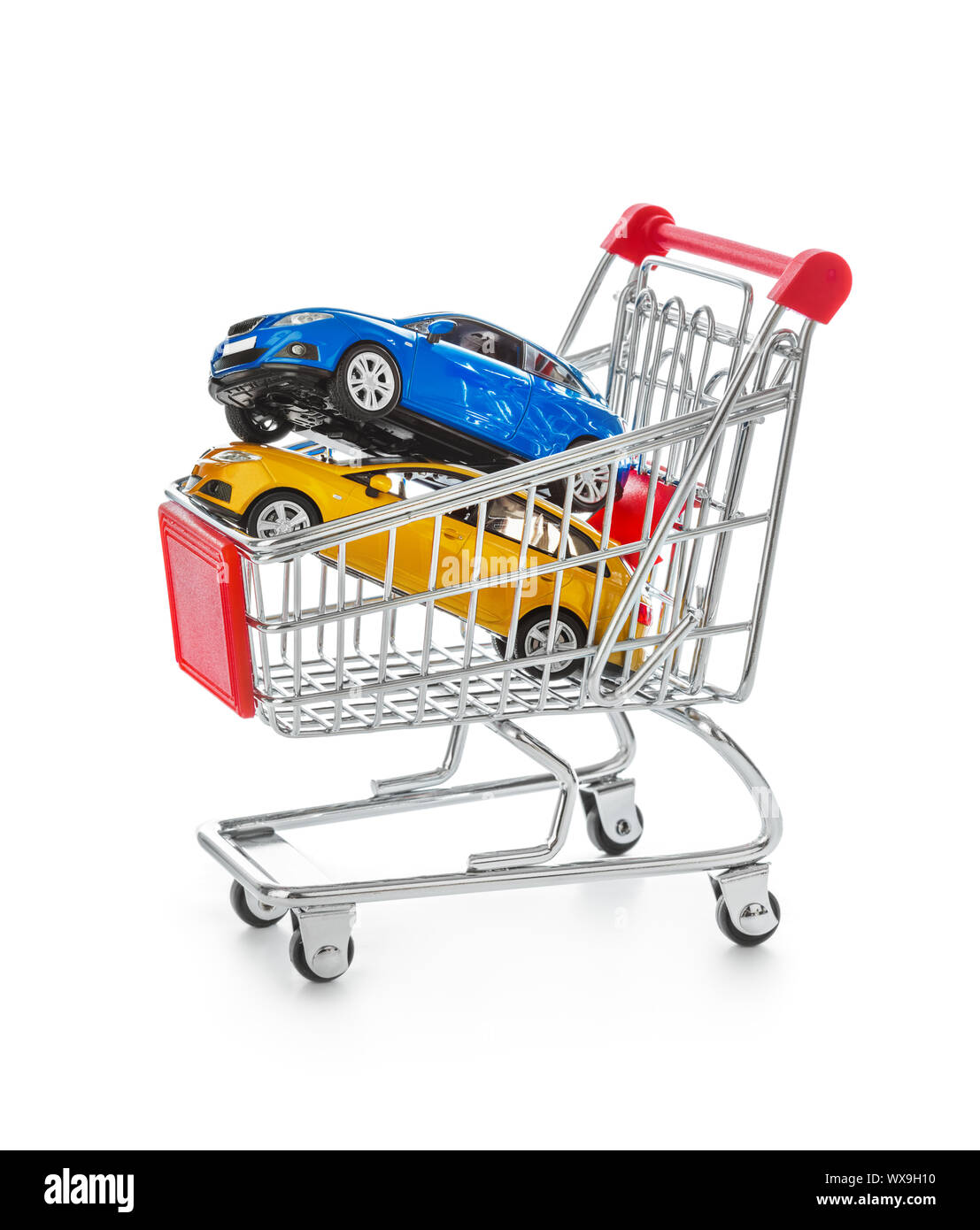 Toy cars in shopping cart Stock Photo - Alamy