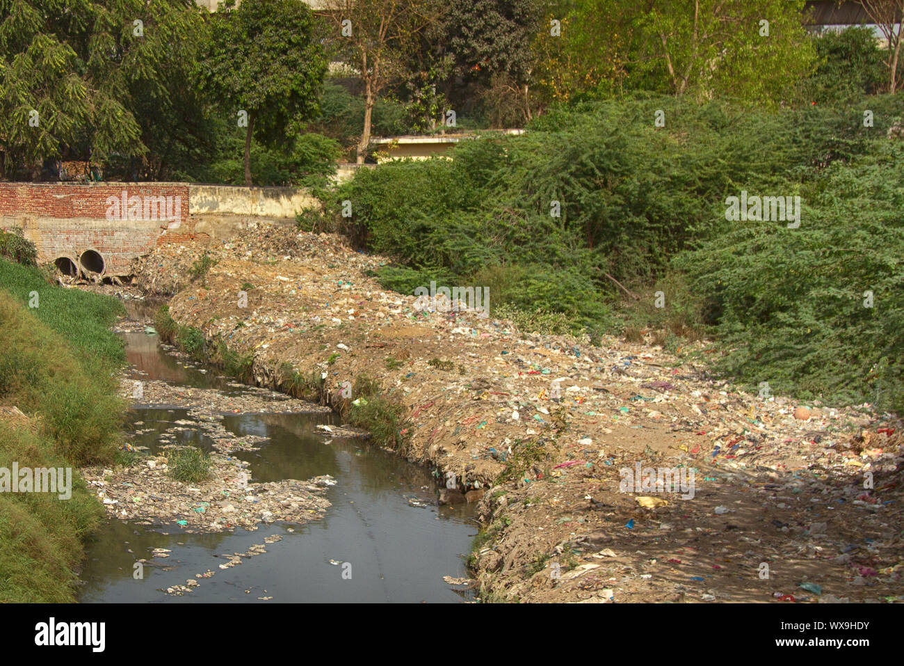 little stream under the road, culvert Stock Photo - Alamy