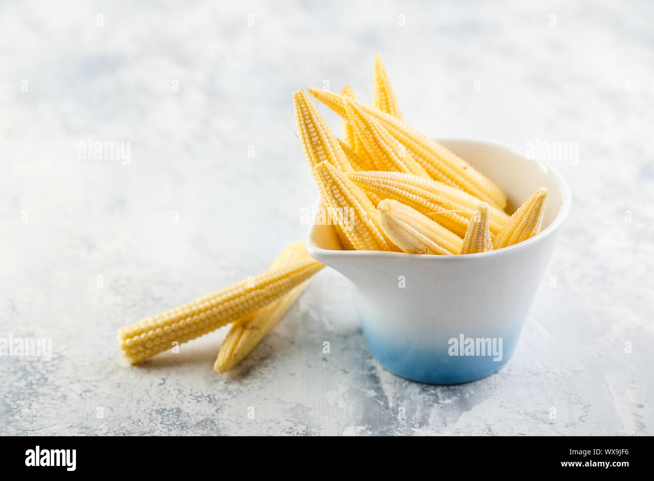 Fresh young baby corn Stock Photo - Alamy