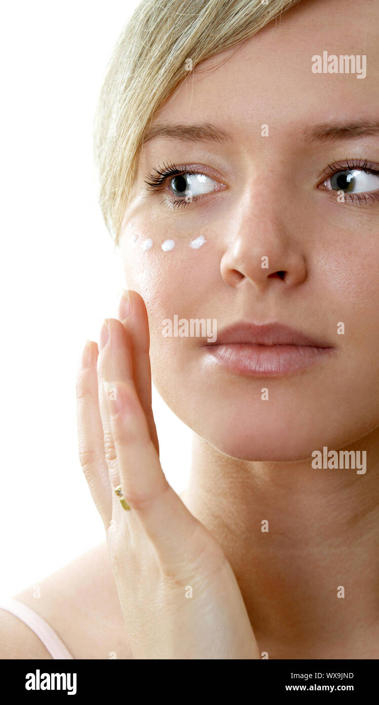 beautiful woman has cream on face Stock Photo - Alamy