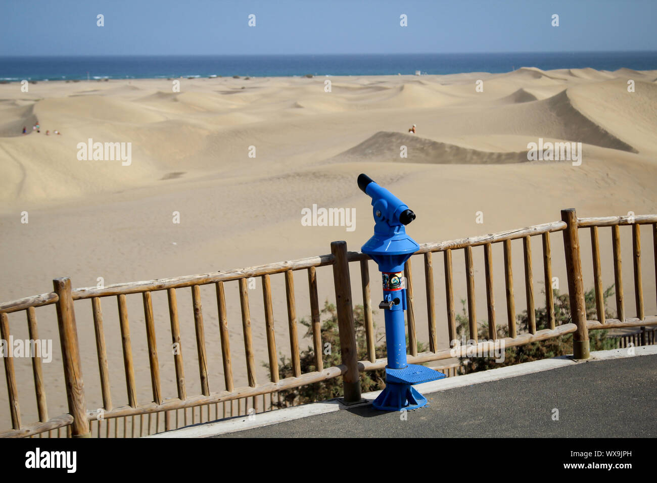 Telescope with a view of the beach Stock Photo - Alamy