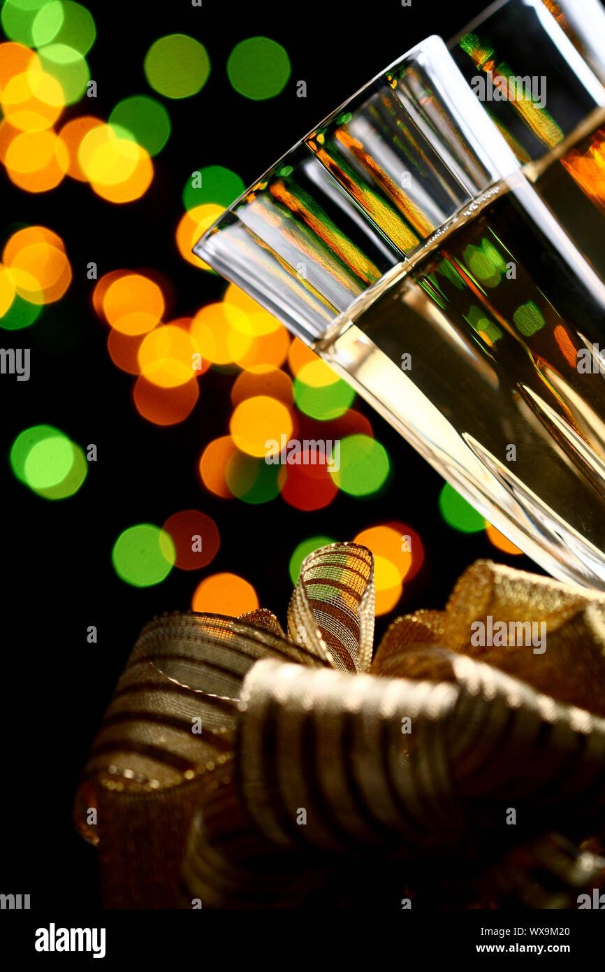 holiday card golden champagne and gift Stock Photo - Alamy