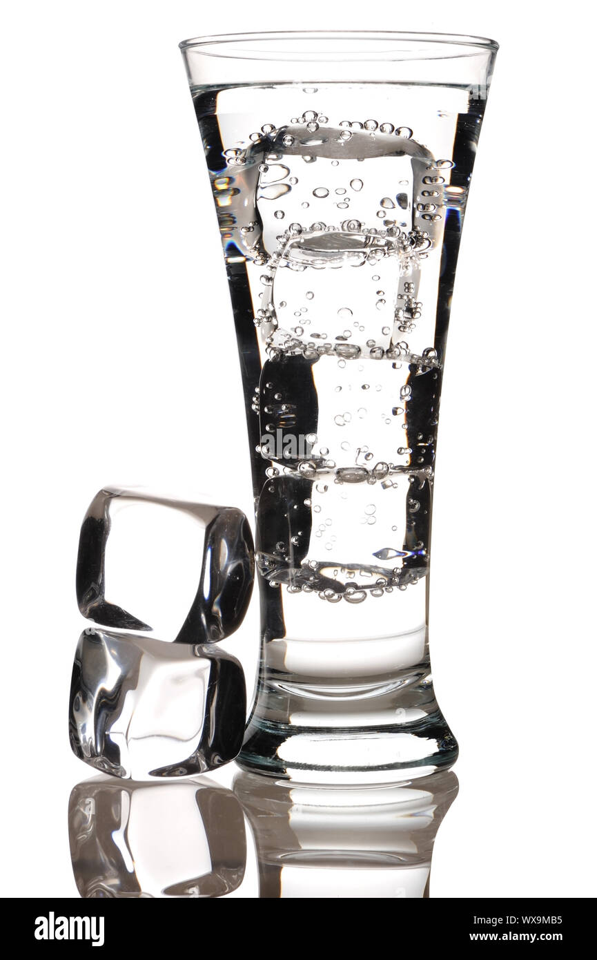 Glass with ice isolated on white background Stock Photo - Alamy