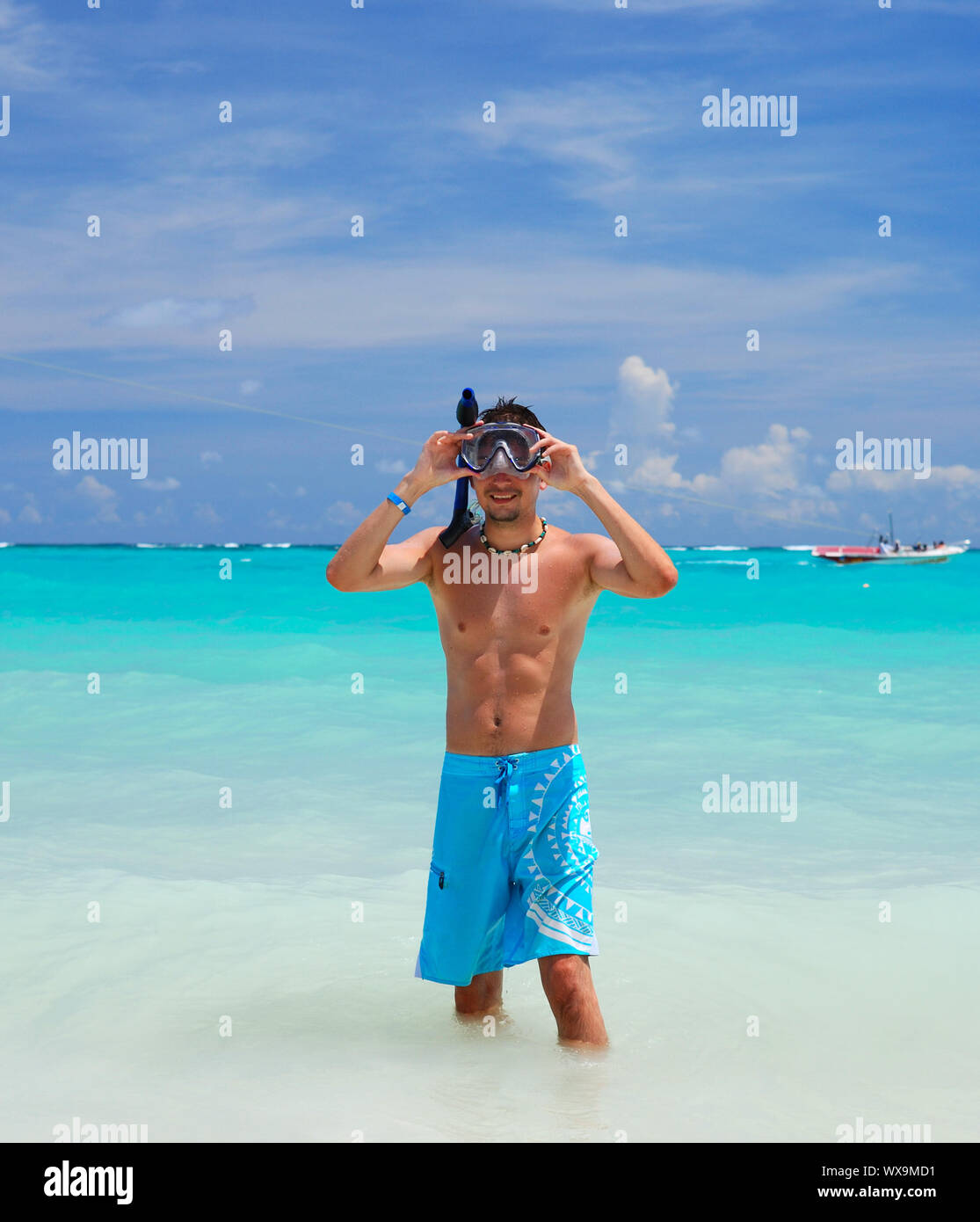 Snorkel man in caribbean sea Stock Photo - Alamy