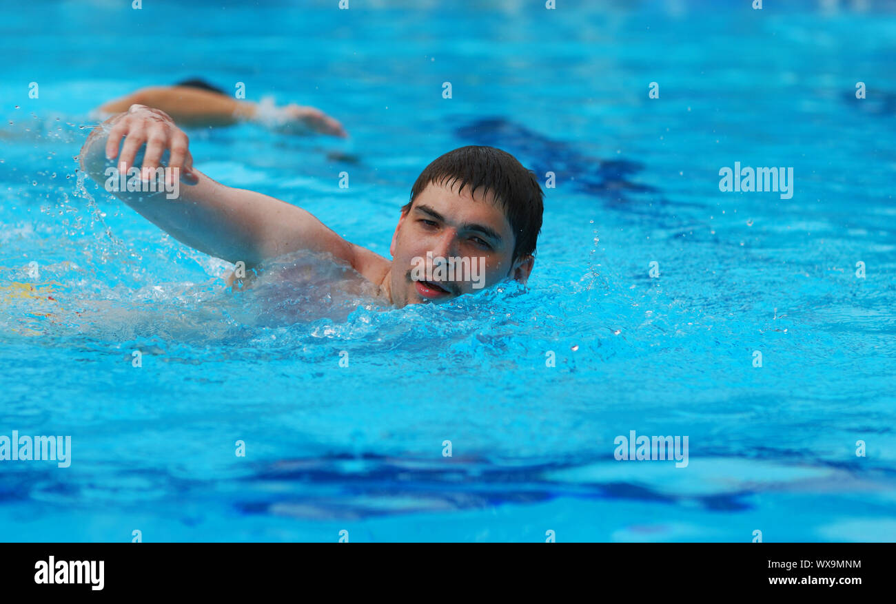 Swimmers in the swimming pool Stock Photo - Alamy