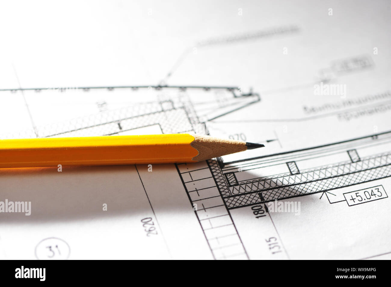 Pencil over house plan blueprints Stock Photo - Alamy