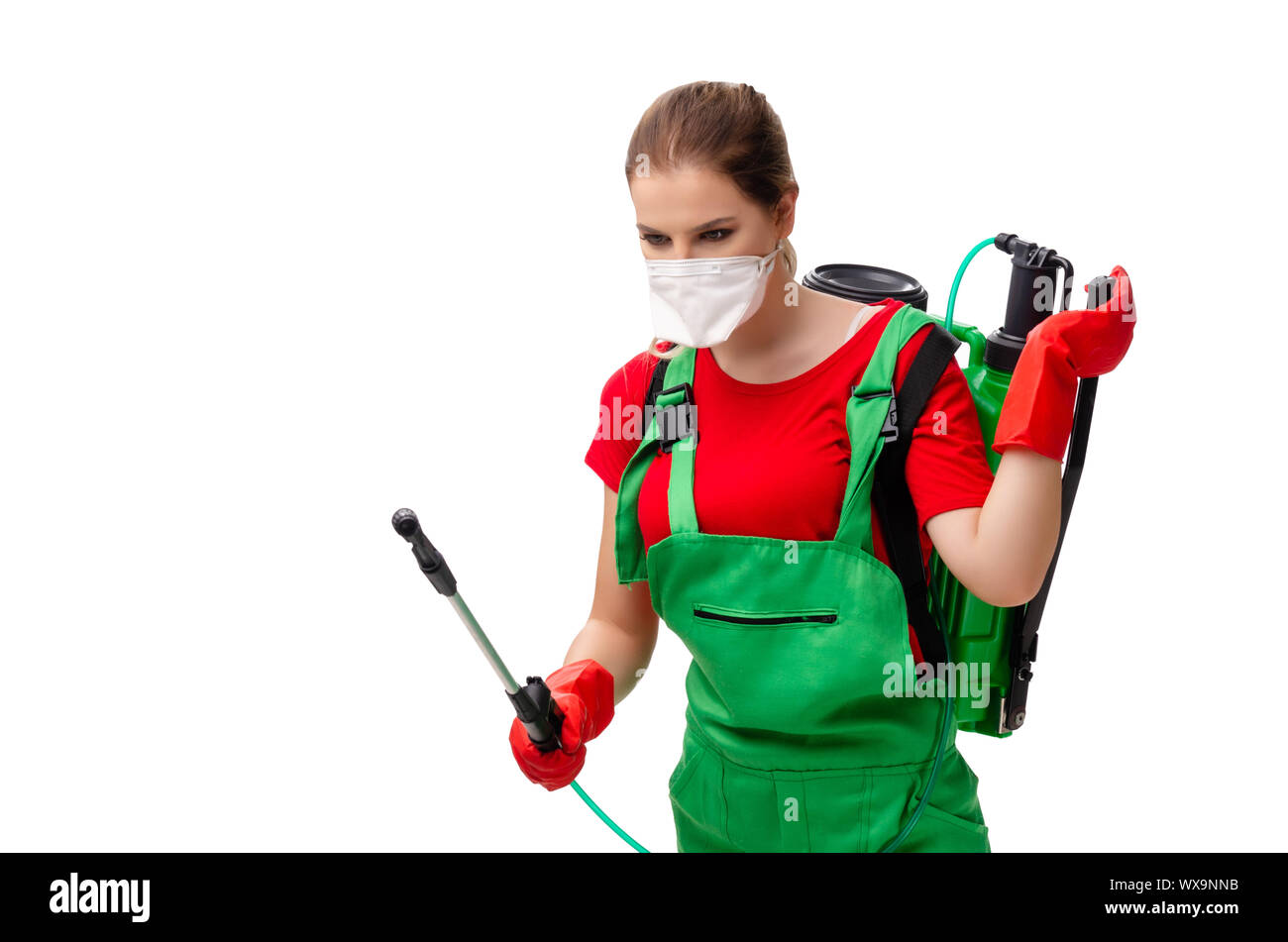 Female pest control contractor isolated on white Stock Photo - Alamy