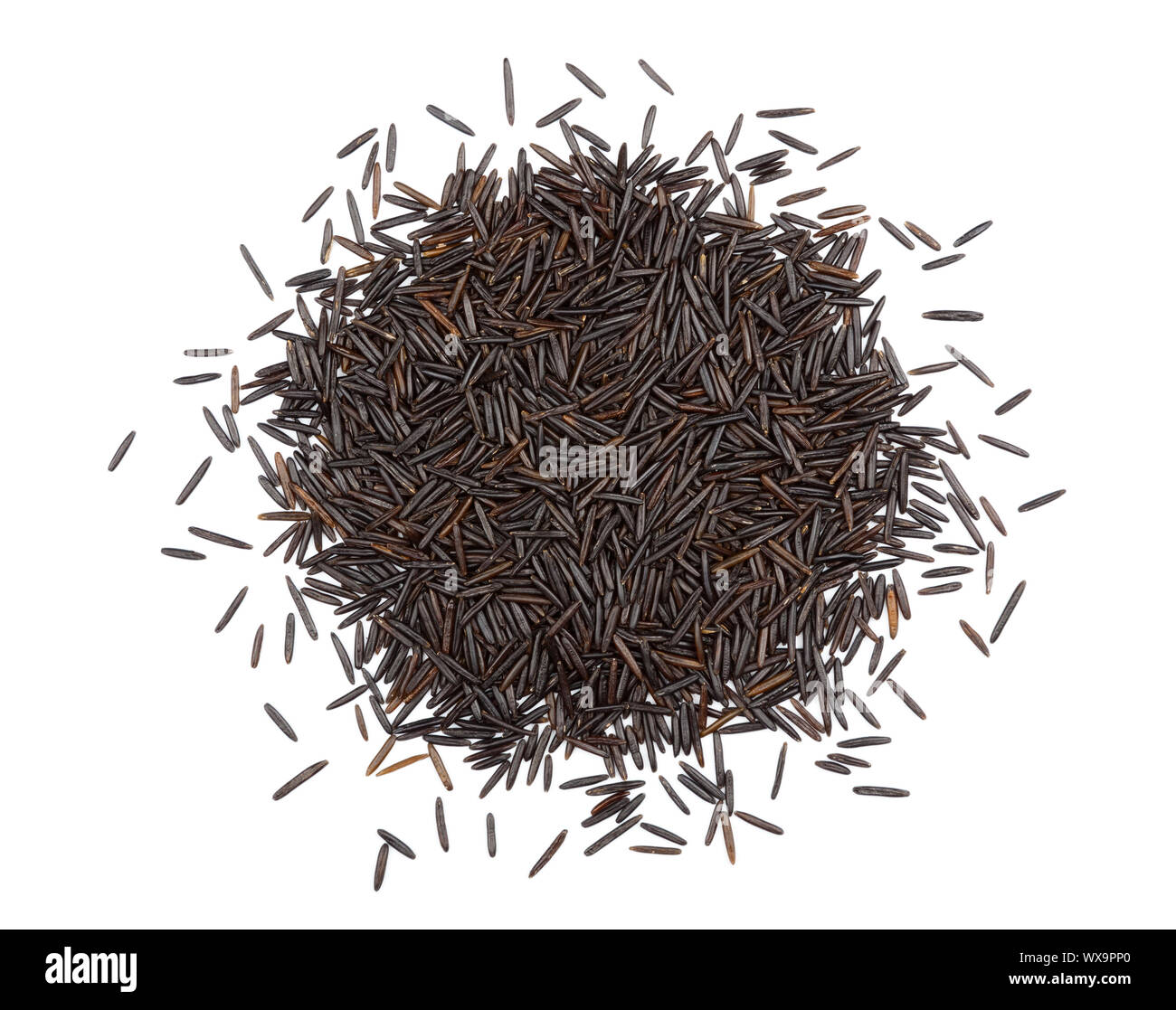 Black rice isolated on white background. Top view Stock Photo - Alamy
