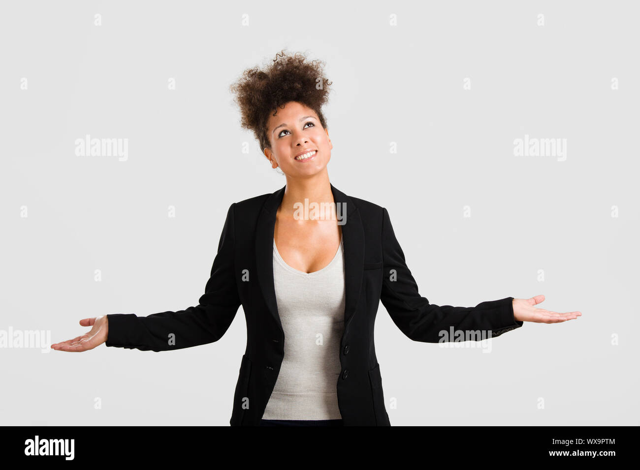 Business woman trying to catch something falling from the sky Stock ...