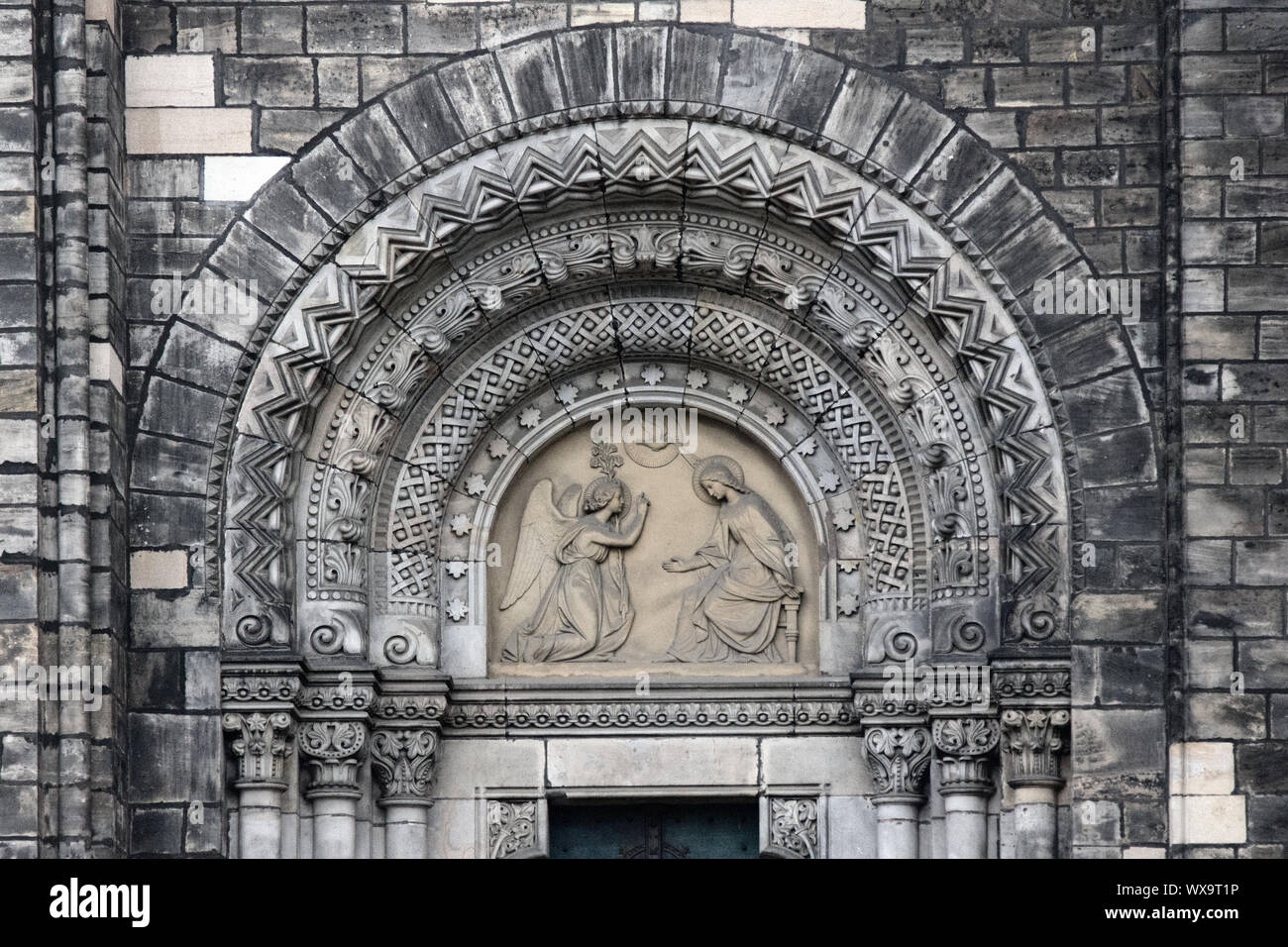 Semi-circular pediment of the Catholic Church Stock Photo - Alamy