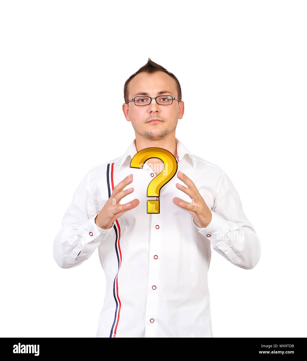 Businessman holding a gold question mark Stock Photo - Alamy