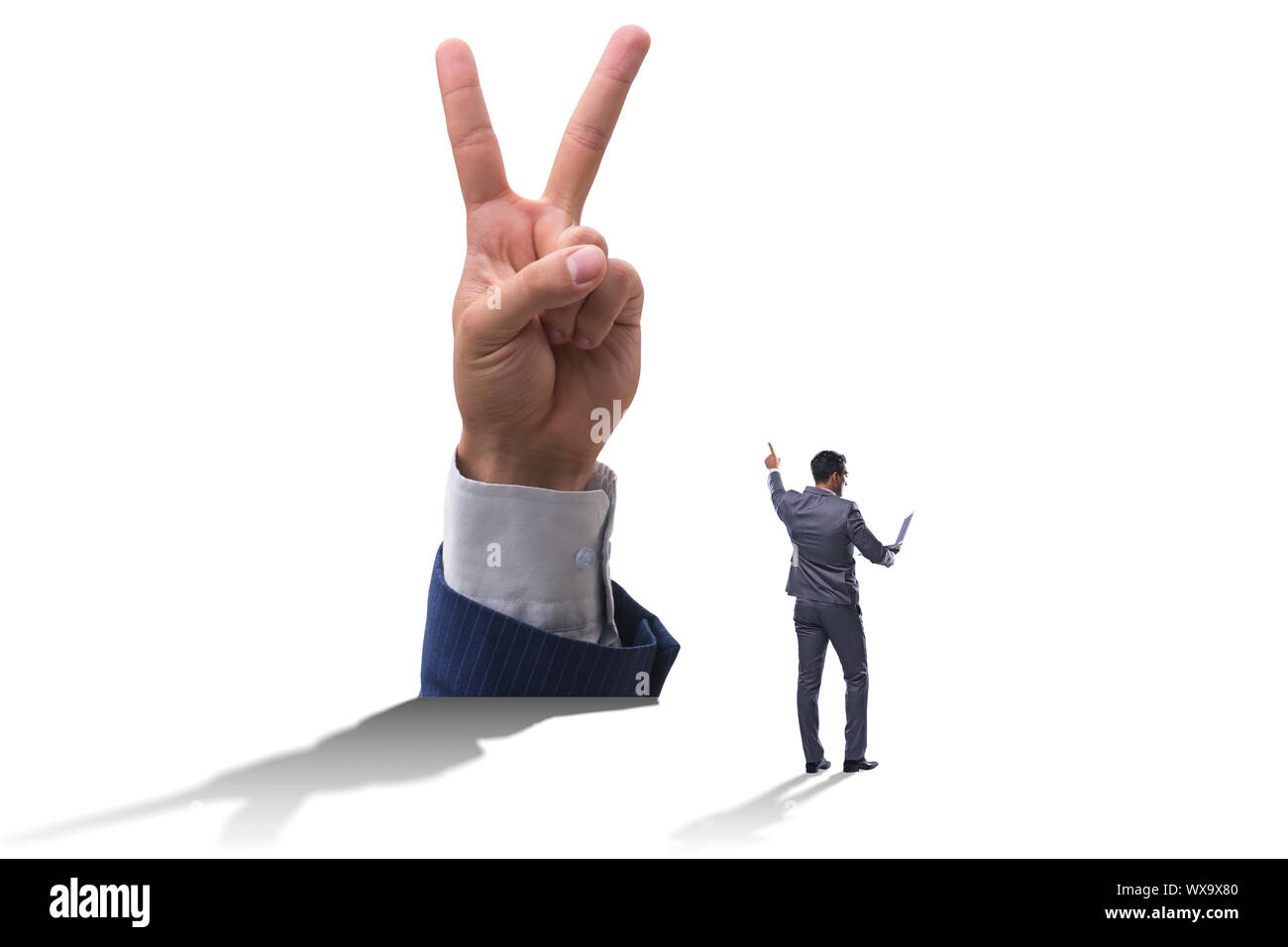 Hands showing victory sign in business concept Stock Photo - Alamy