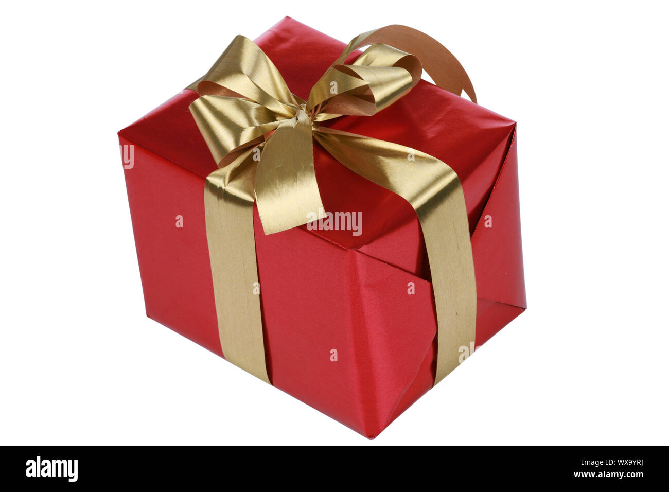 Red gift box with gold ribbons Stock Photo - Alamy