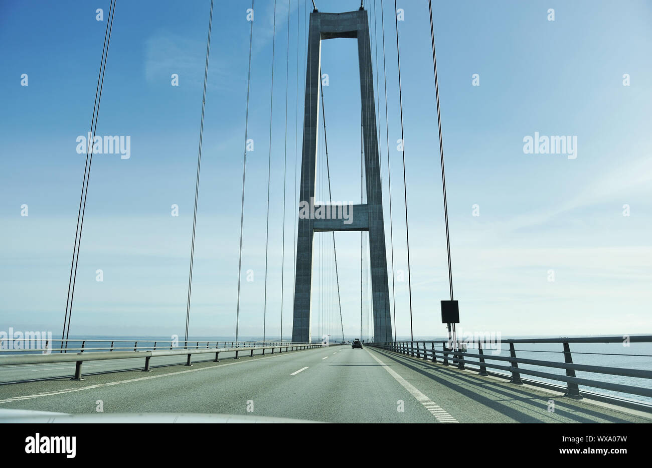 Road through the bridge in Denmark Stock Photo - Alamy