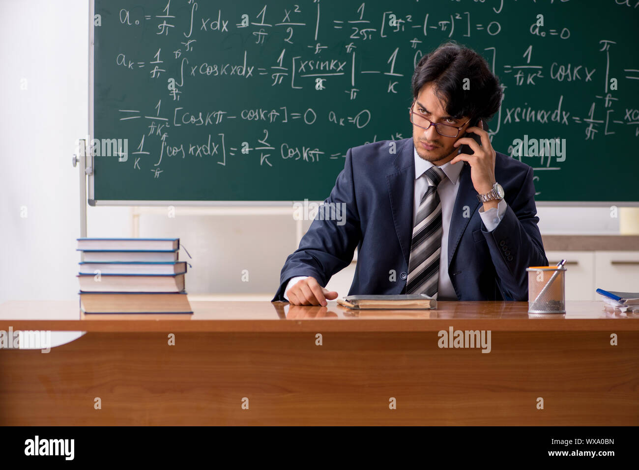 Strict teacher desk hi-res stock photography and images - Alamy