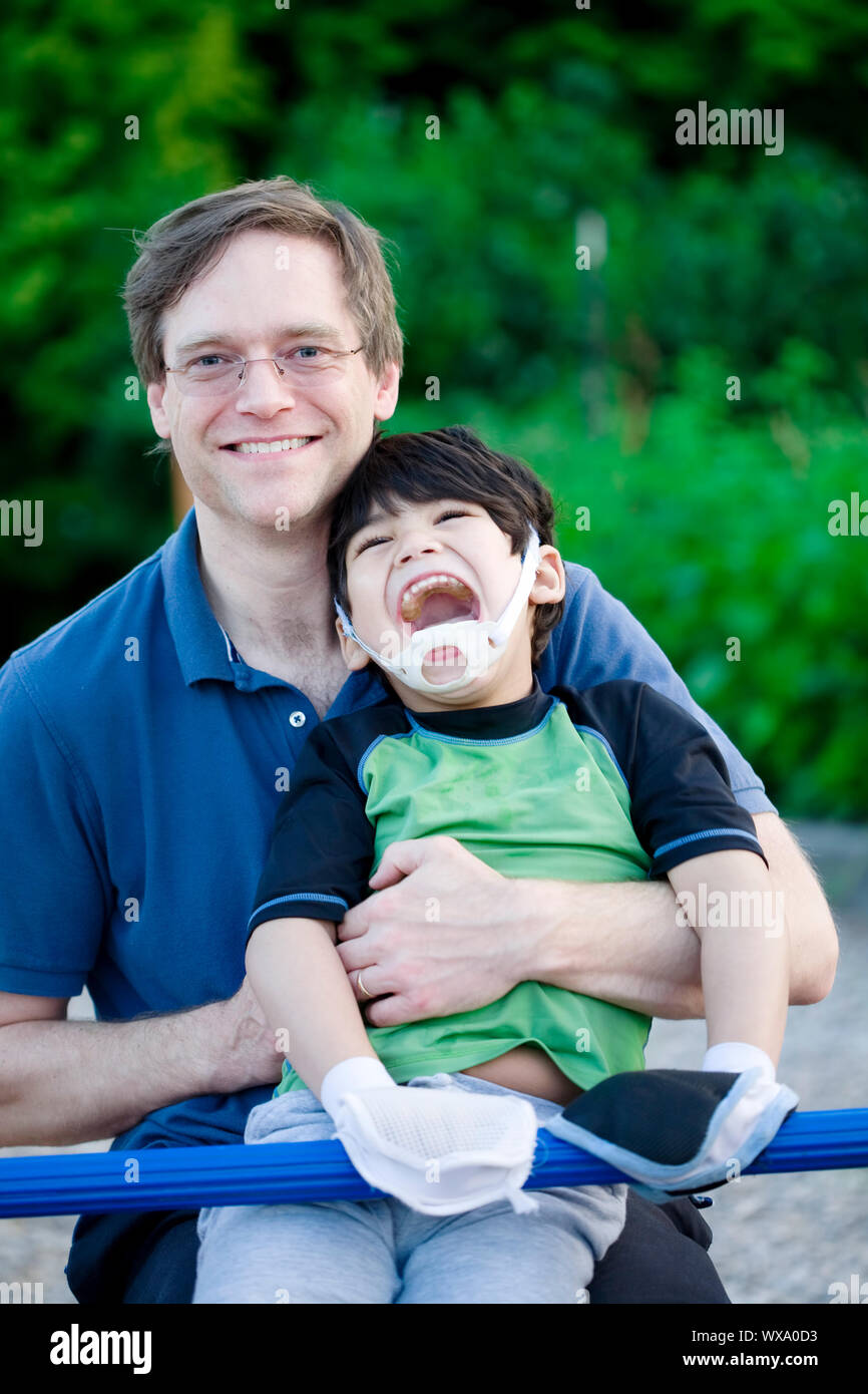 Child helping disabled parent hi-res stock photography and images - Alamy