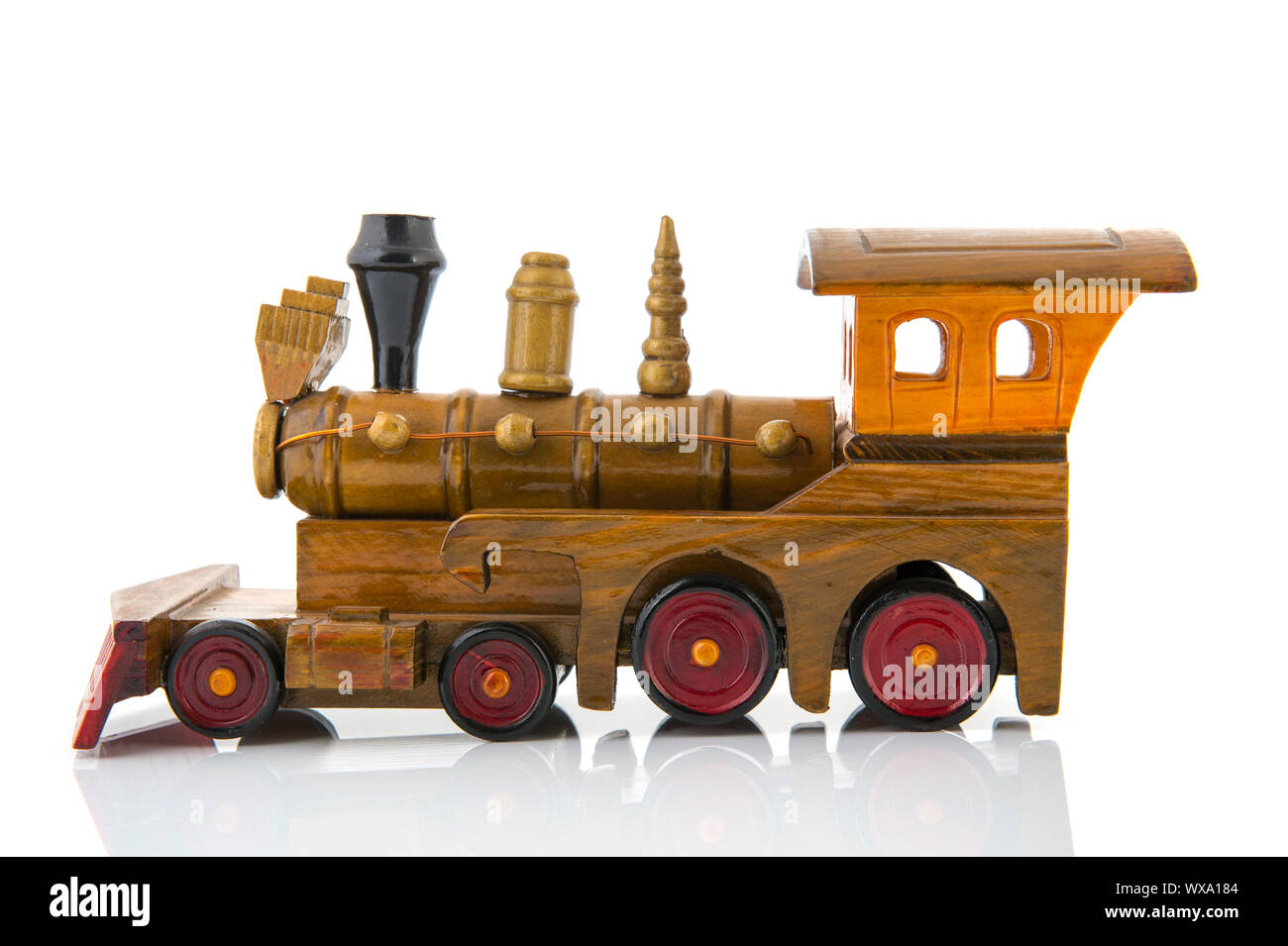 wooden toy train isolated over white background Stock Photo - Alamy