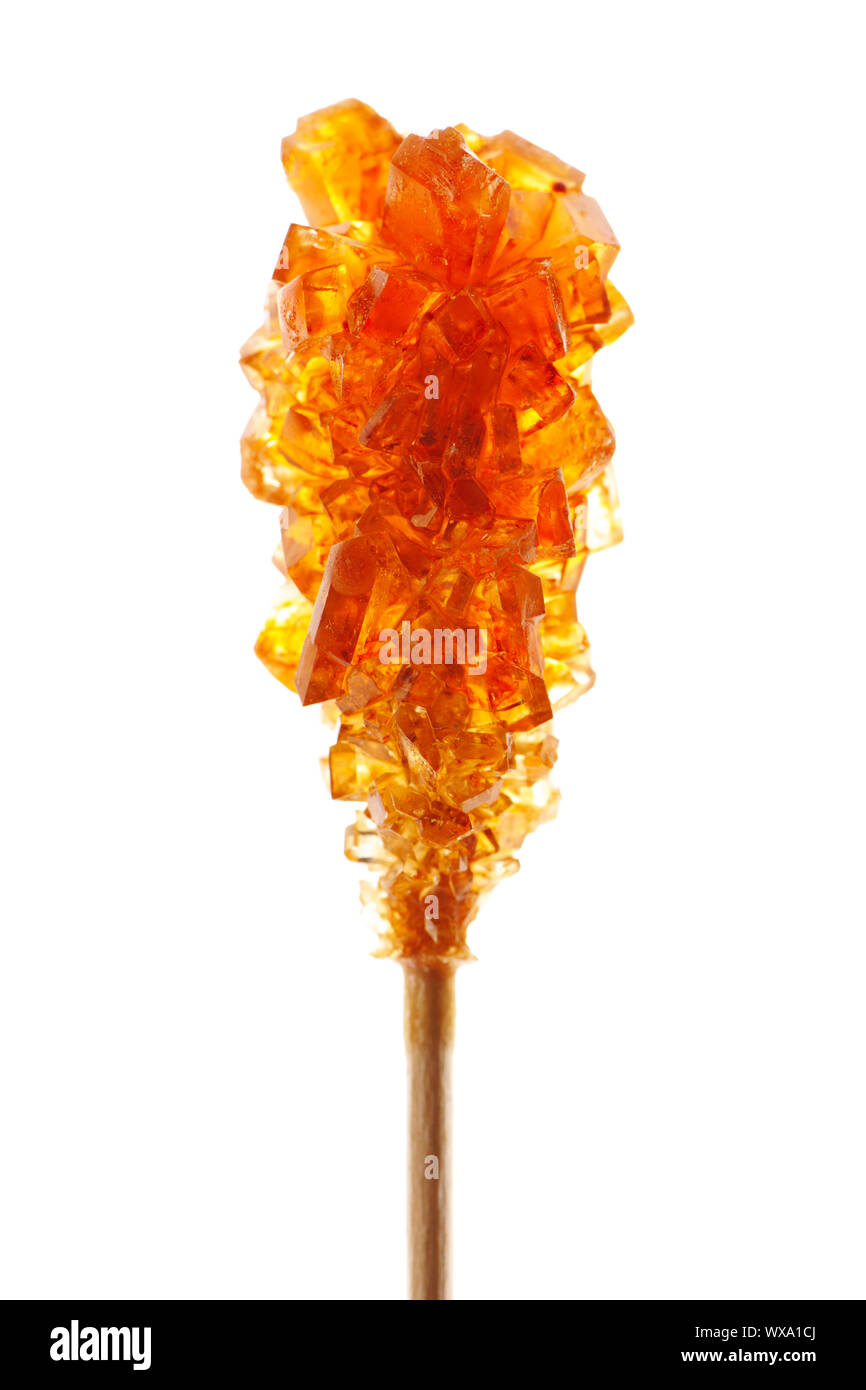 Brown sugar stick isolated on white background Stock Photo - Alamy