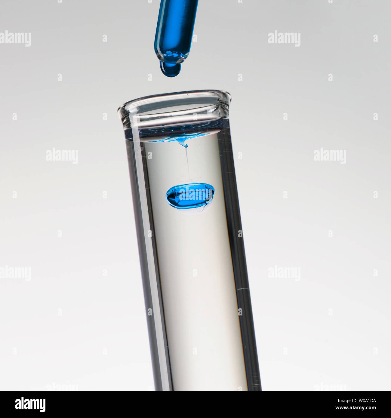 Test tube and pipette close-up Stock Photo - Alamy