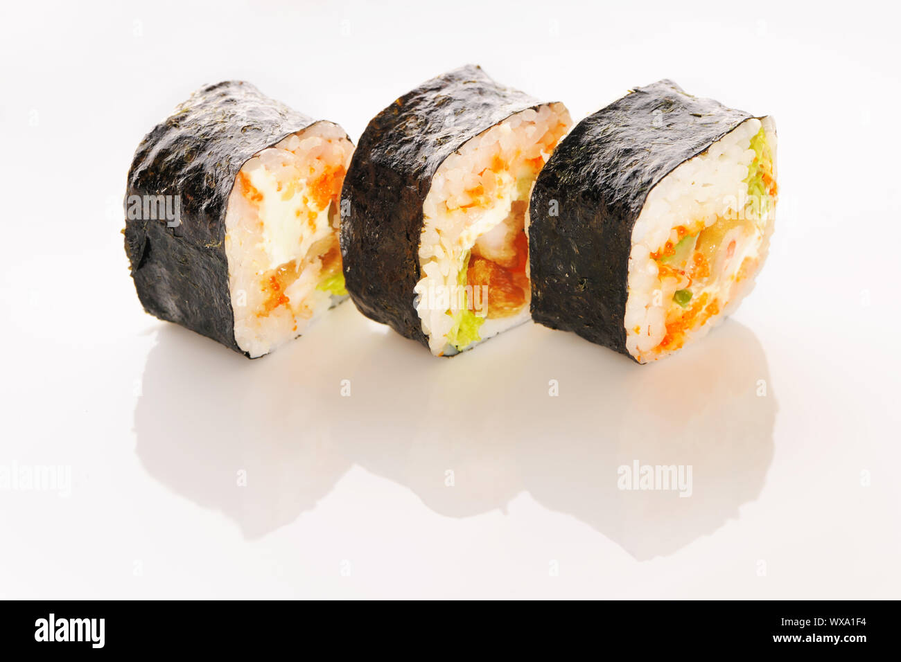 Sushi rolls over grey background Stock Photo - Alamy