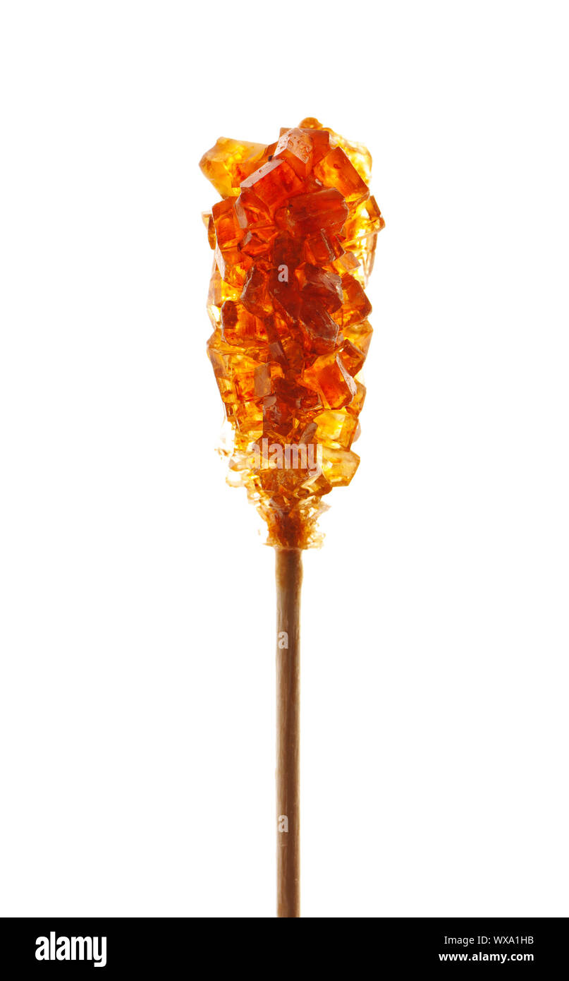 Brown sugar stick isolated on white background Stock Photo - Alamy