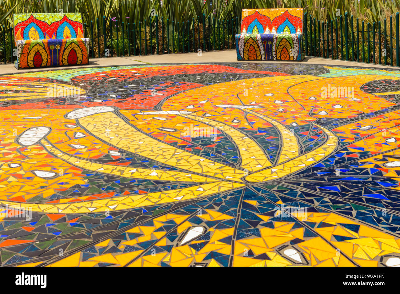 Bogota park with floor and benches with coloured mosaic Stock Photo - Alamy