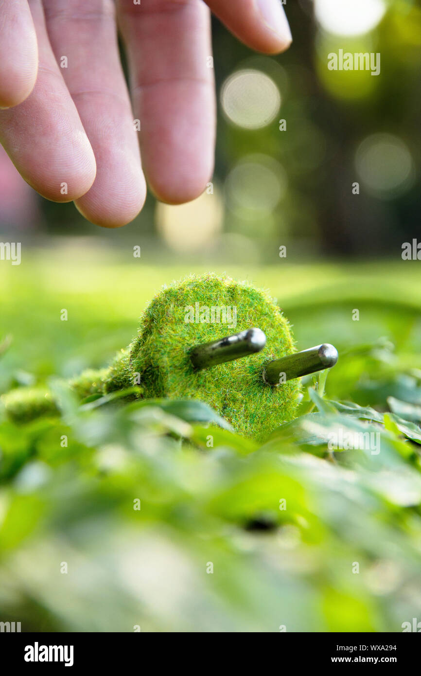 green electric plug concept Stock Photo - Alamy