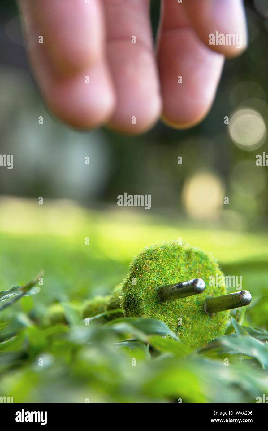 green electric plug concept Stock Photo - Alamy
