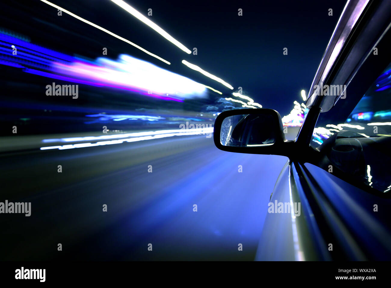 car fast drive on highway in night Stock Photo - Alamy
