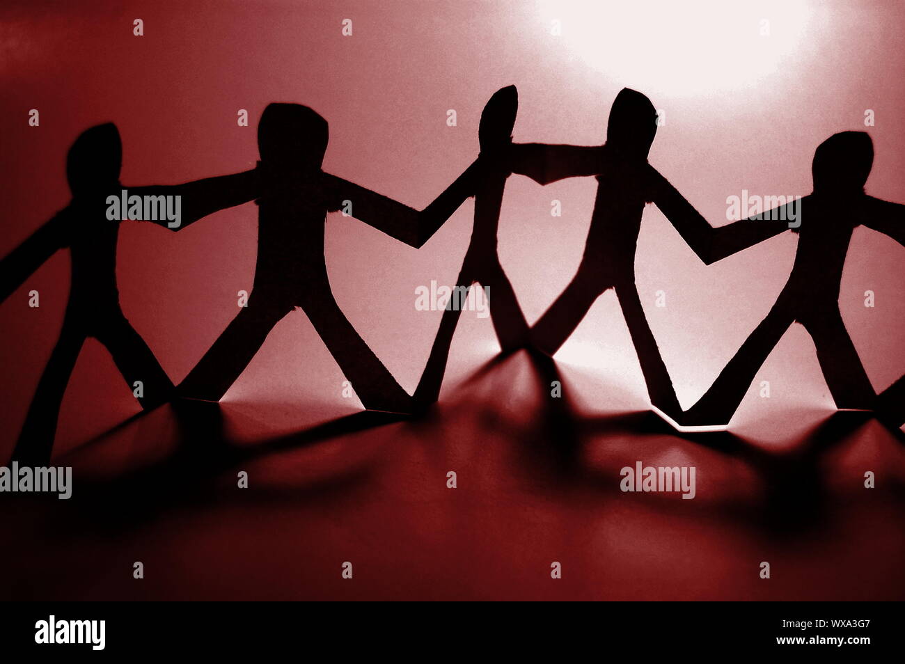 team of paper people having a party Stock Photo - Alamy